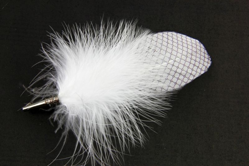 Stunning Feather brooches with a unique feather pattern.