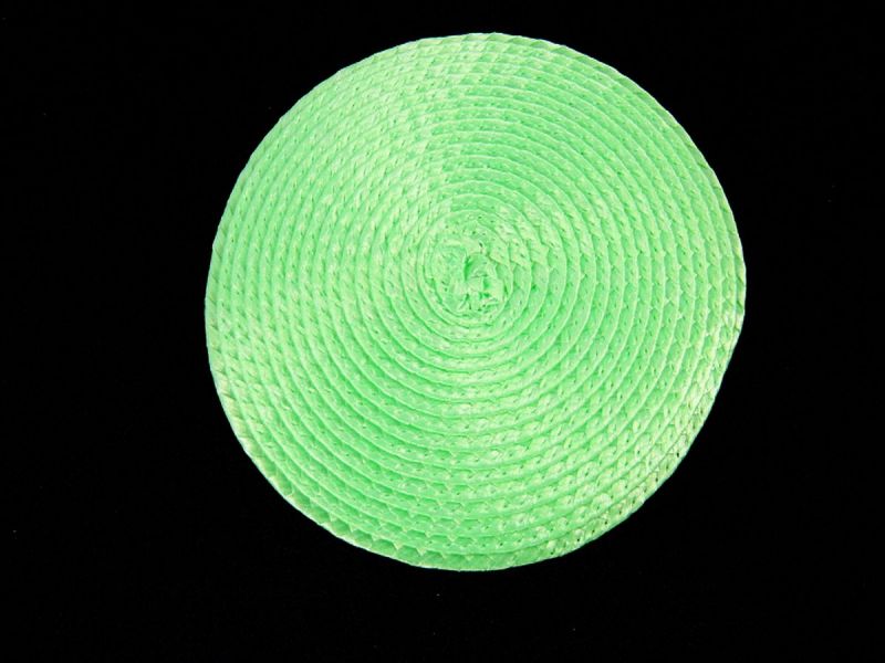 Synthetic flo green 11cm disc for millinery use.